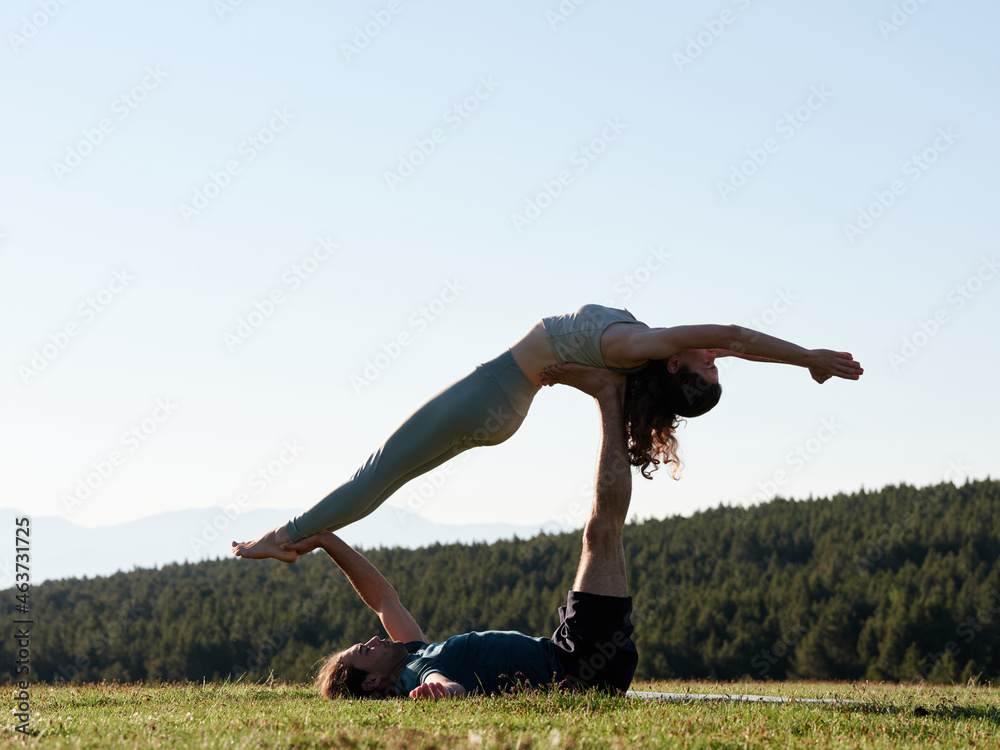 Whale pose on lawn. Stock Photo | Adobe Stock