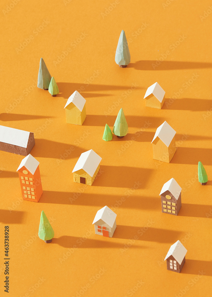 Miniature with Christmas tree and paper houses. Stock Photo | Adobe Stock