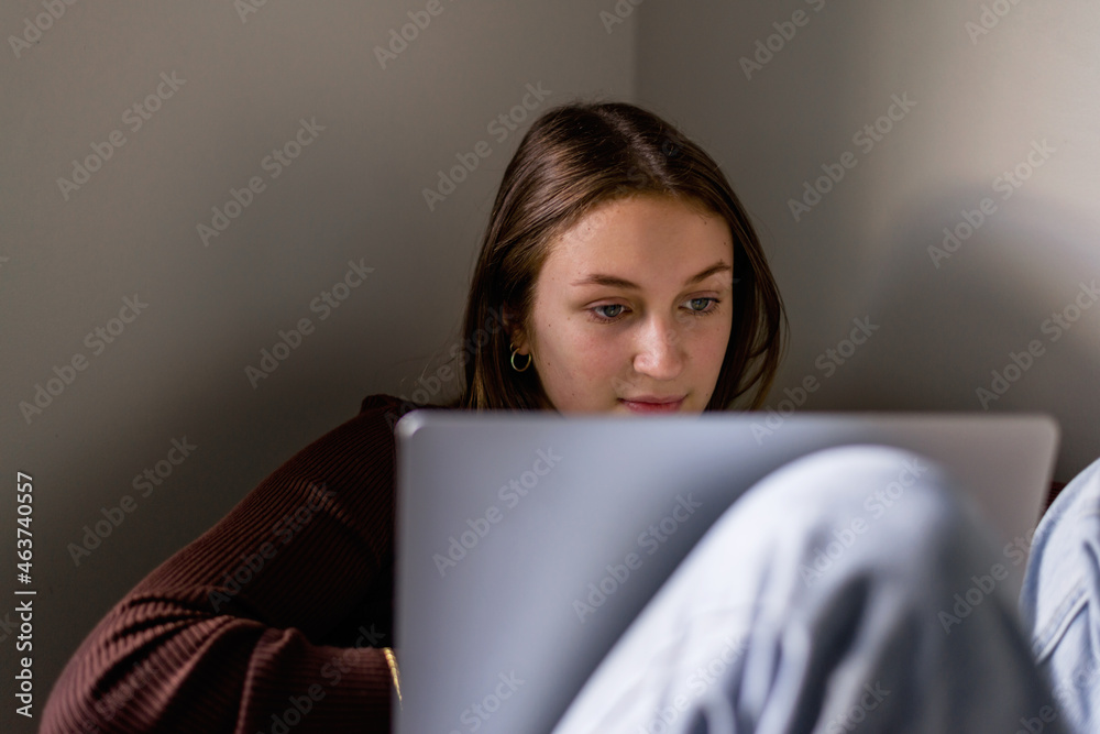 teen using computer Stock Photo | Adobe Stock