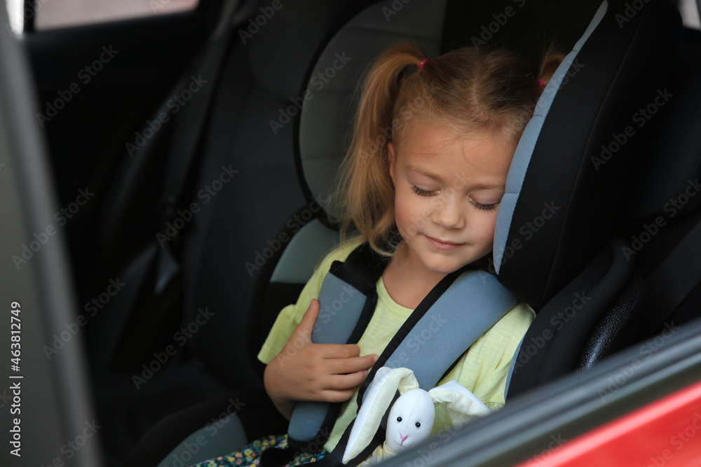 Cute little girl sleeping in child safety seat inside car Stock Photo ...