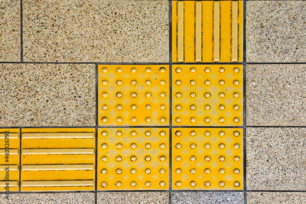 Guidance and warning blocks for the visually impaired / 視覚障害者用の誘導ブロックと ...