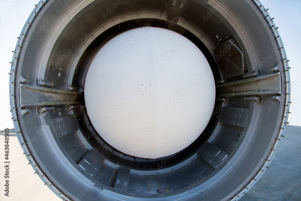 The head of an intercontinental ballistic missile is white in a metal ...