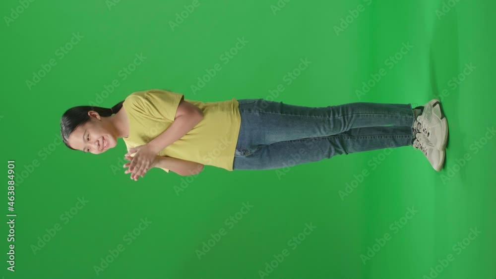 Full Body Of Side View Of Young Asian Kid Girl Clapping Her Hands In ...