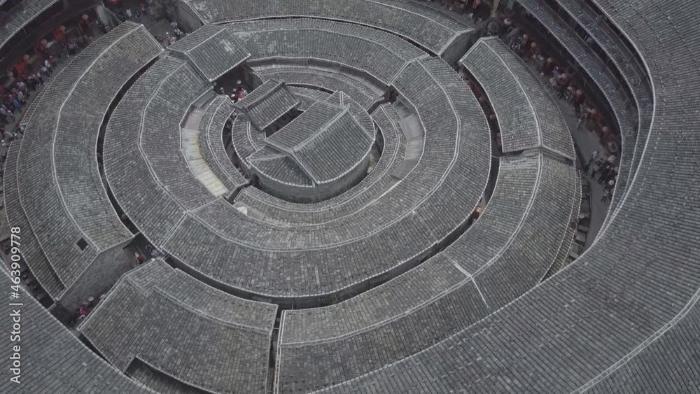 Traditional earthen Tulou Chinese huts, a landmark tourist attraction ...