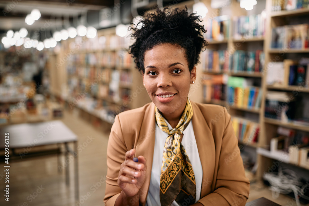 Happy African American female professor holding online class from a ...