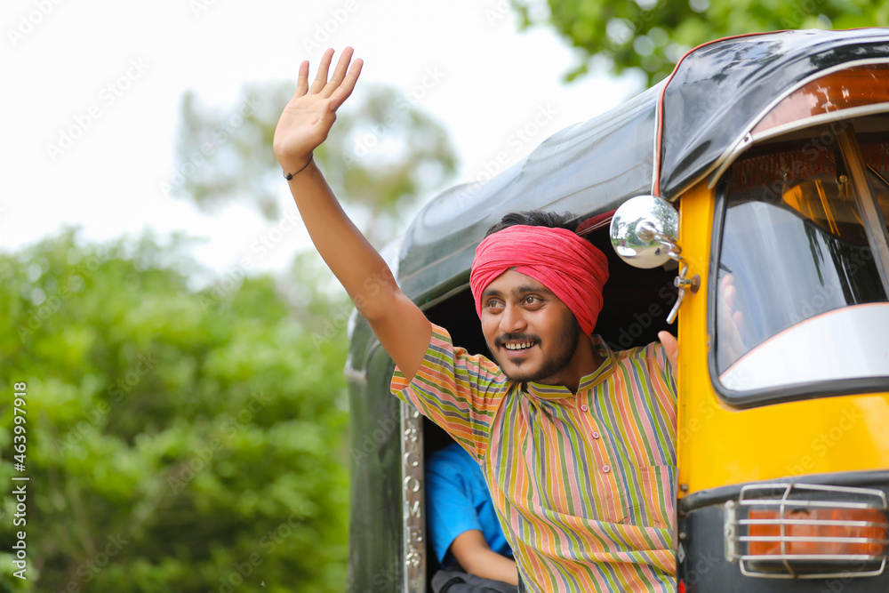 Indian auto rickshaw three-wheeler tuk-tuk taxi driver man Stock Photo ...