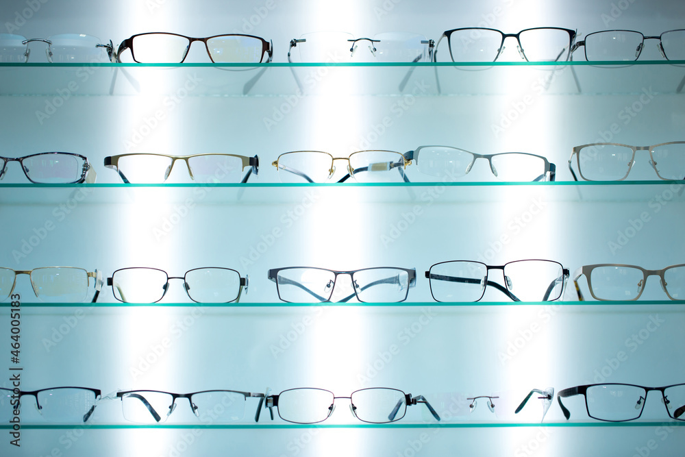 Glasses for sight on the shelves of optics. Large selection of glasses ...