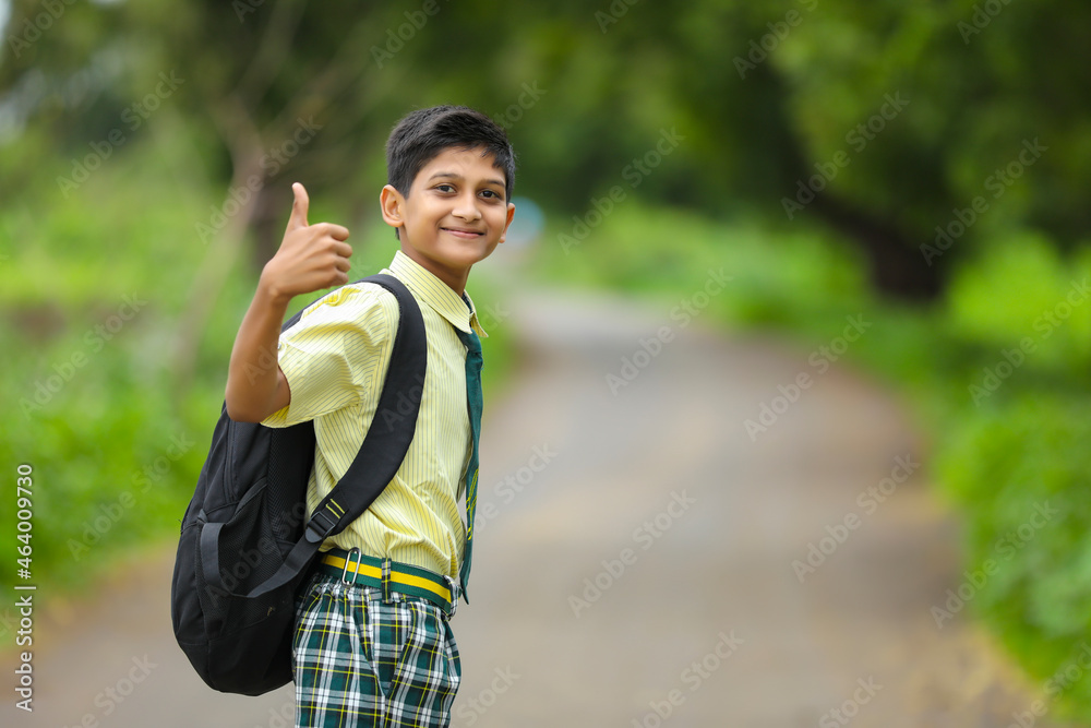 Excited school boy running and jumping on street after school. Stock ...