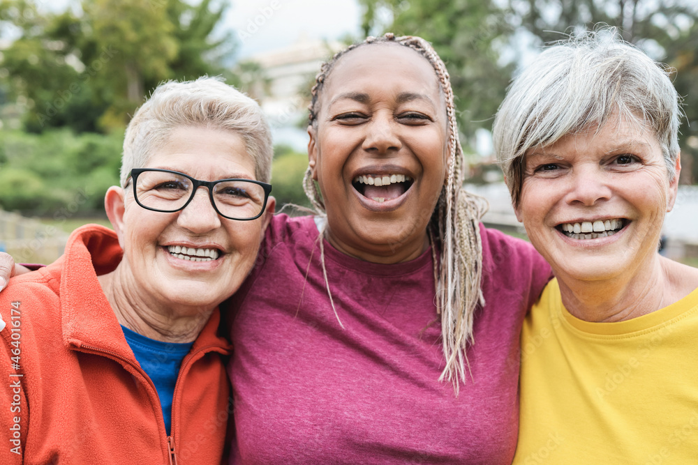 Multiracial senior women having fun together after sport workout ...