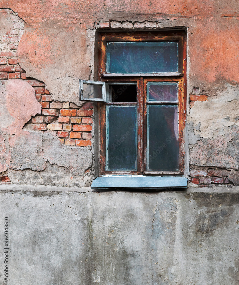 ruined and abandoned house exterior. Abandoned house. Broken glass in ...