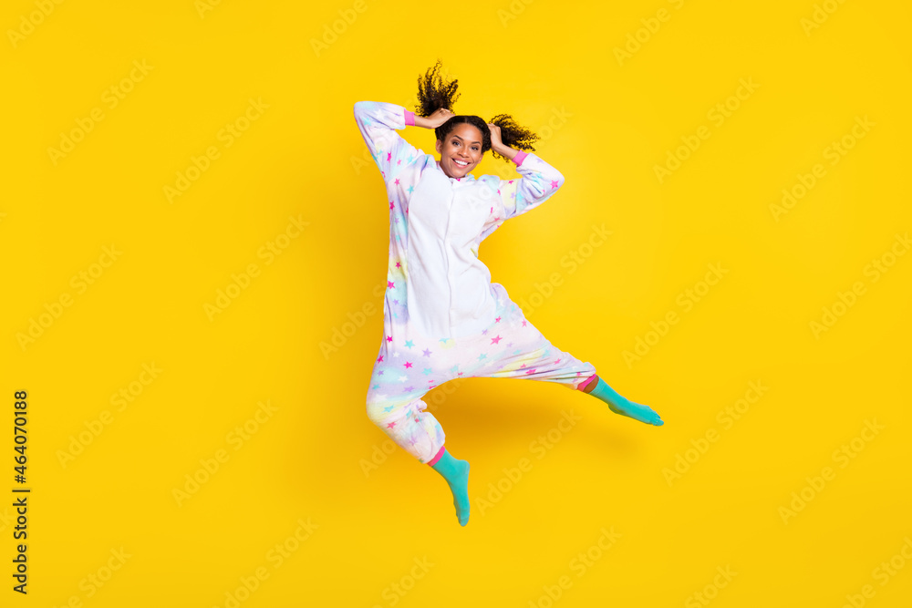 Full length body size view of pretty cheerful girl jumping making tails ...