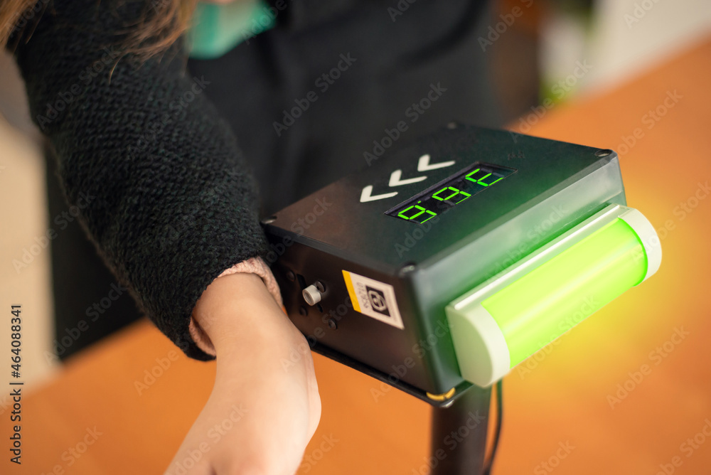 Safety rules while pandemic. Checking temperature with automated ...