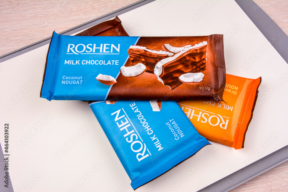 Roshen Dark chocolate bar with almond isolated on white made by Roshen ...