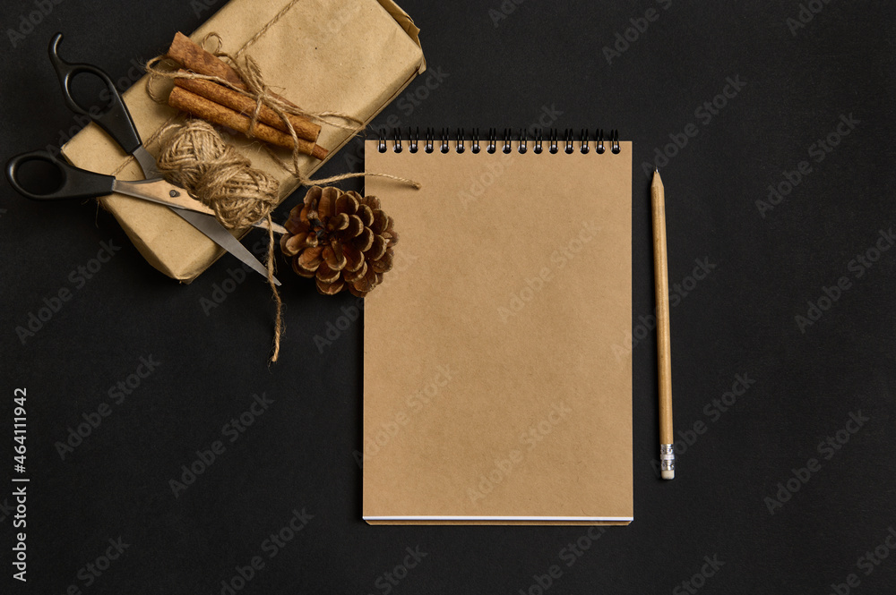 Flat lay of a craft notebook with blank paper sheet, wooden pencil ...