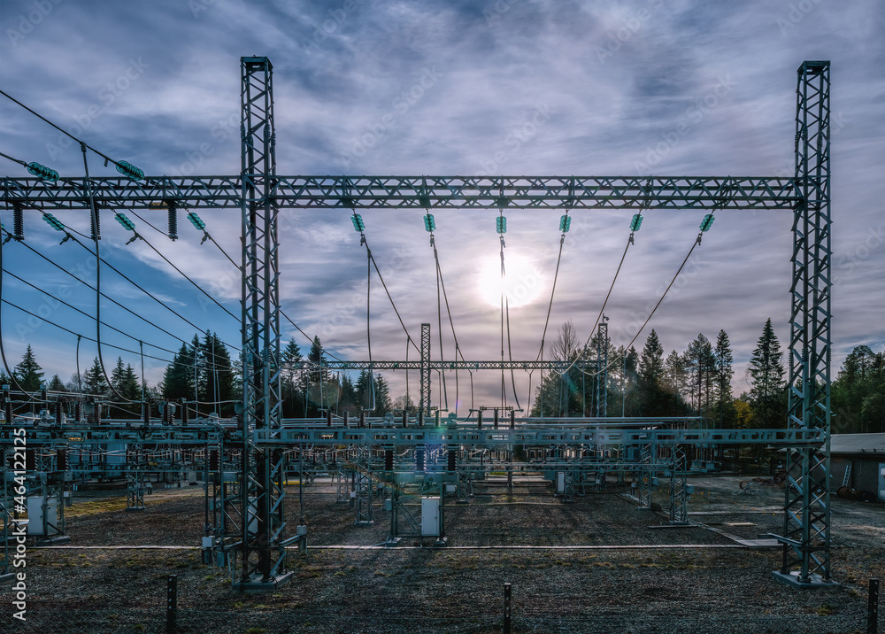 High voltage power transformer substation - wires with Sun at ...