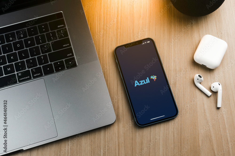 Azul Airlines app on the smartphone screen on wooden background with a ...