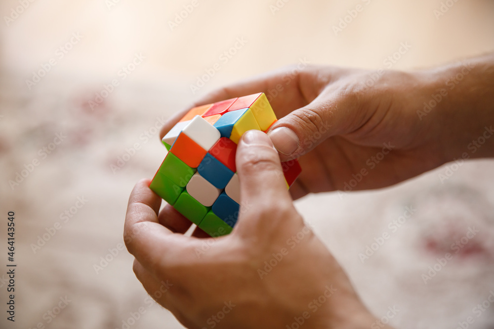 Moscow Russia October 10, 2021. Male hands holding Rubik's cube close ...
