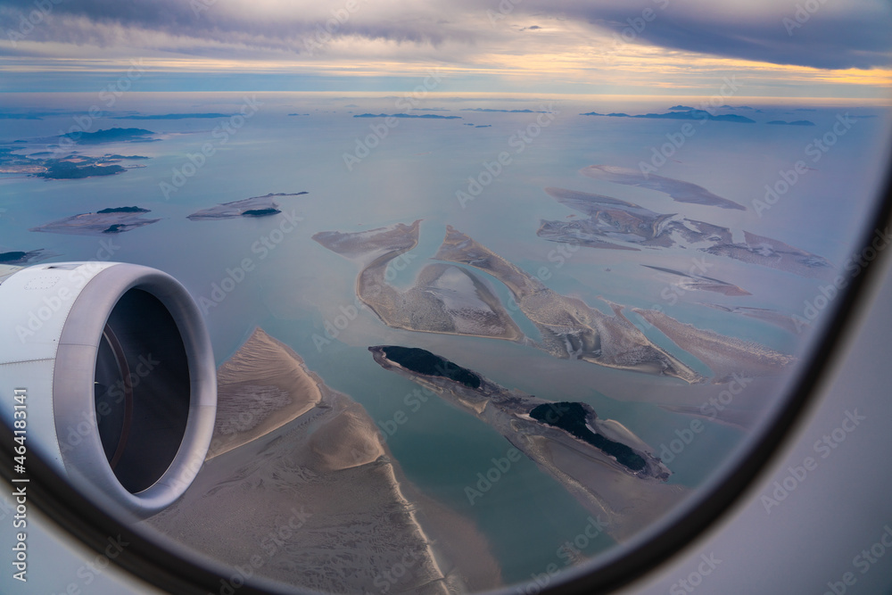 View from the window of a passenger plane during the climb over the ...