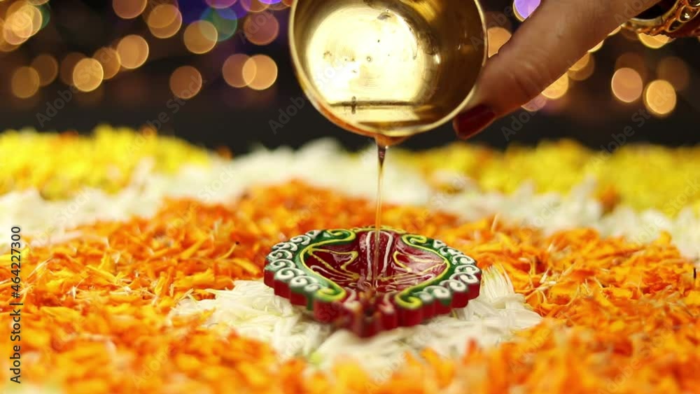 Filling Or Pouring Oil In Decorative Clay Diya Deep Or Dia Placed On ...