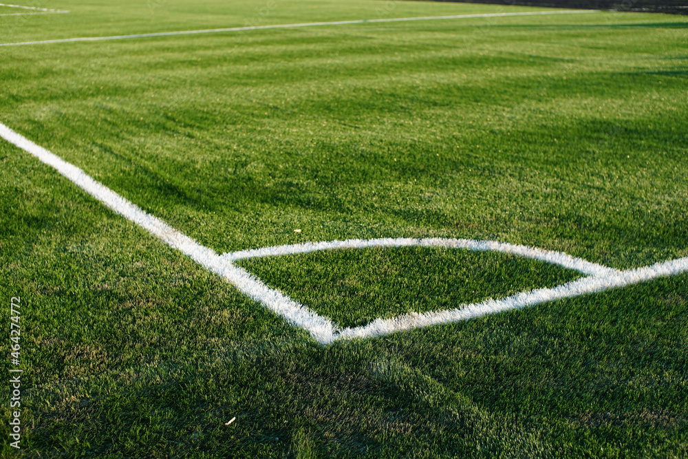 green synthetic grass surface on a soccer ground, european football ...
