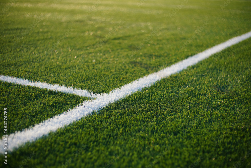 green synthetic grass surface on a soccer ground, european football ...