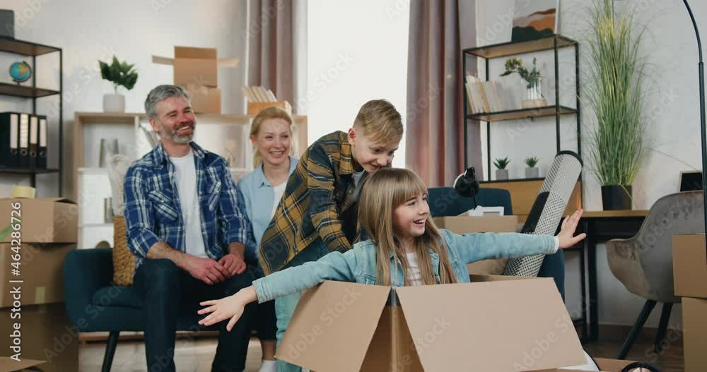 Vídeo do Stock: Attractive smiling happy loving parents watching how ...