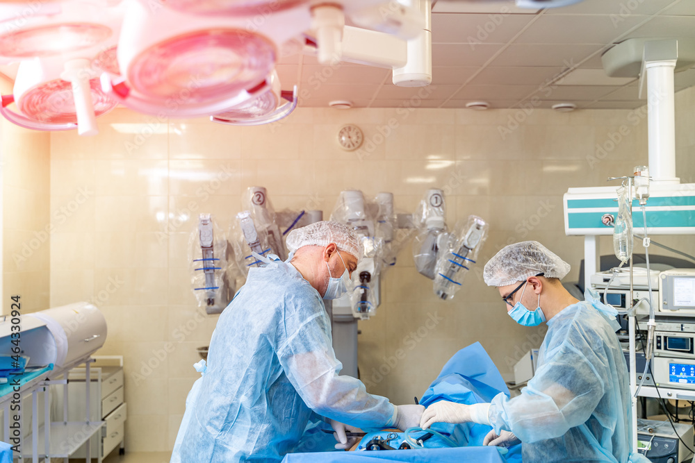 Surgeons working in operating room. Surgeons working in operating room ...
