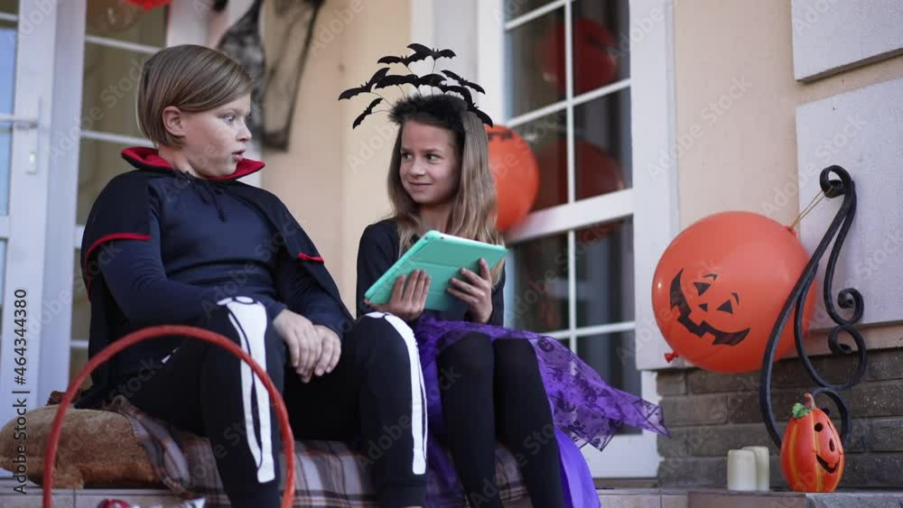 Scared boy with frightened facial expression looking at girl showing ...