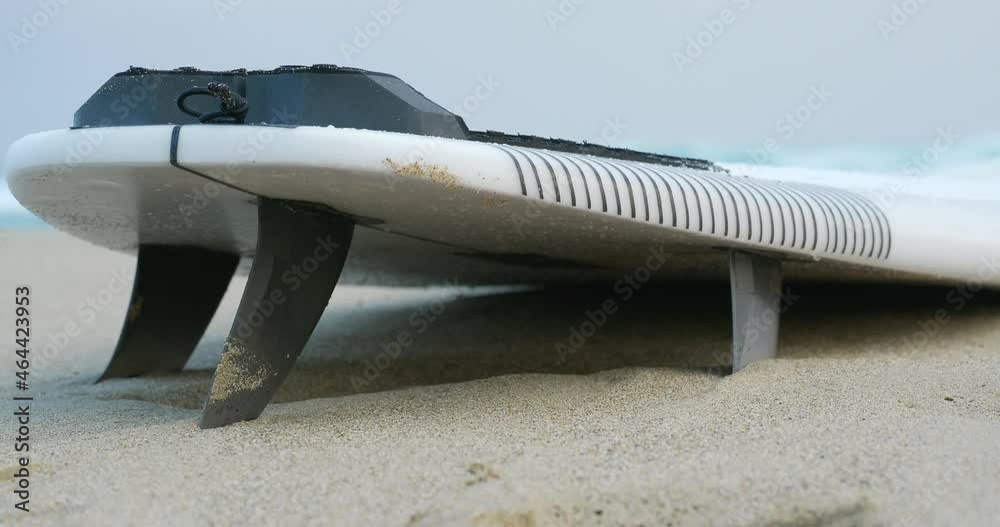 White surfboard on sand surfing beach. Stock Video | Adobe Stock