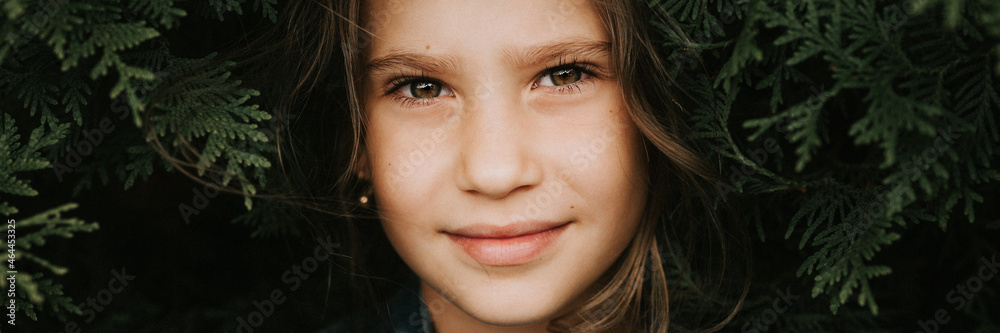 portrait of the face of a cute happy caucasian candid healthy eight ...