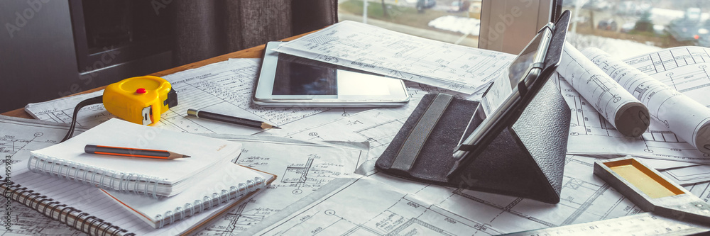 Architect works remotely from home in quarantine, lockdown covid 19 coronavirus. Remote work ...