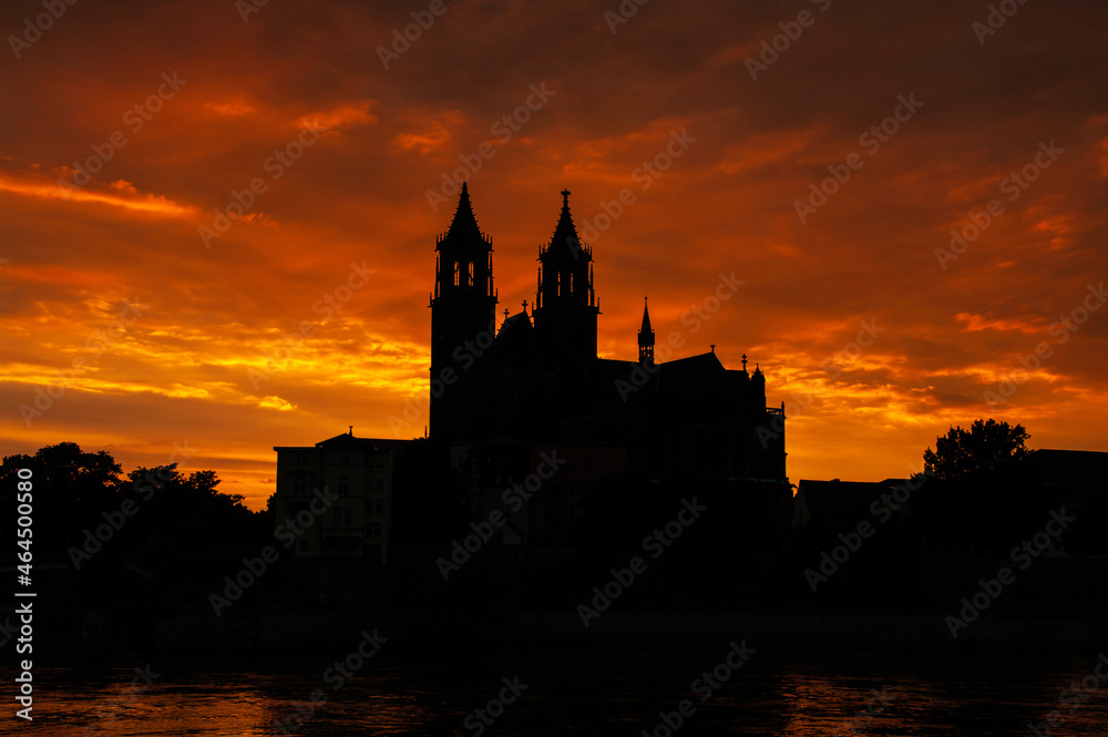 Silhouette of a medieval castle at beautiful bloody sunset at ...