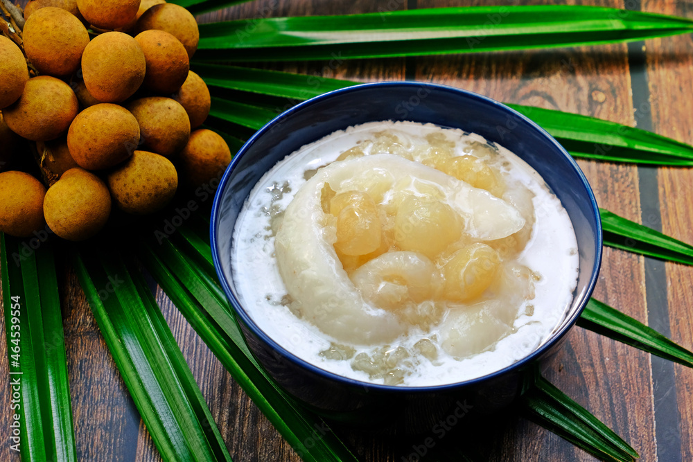 Sweet sticky rice with longan and coconut sliced in coconut milk (Kao ...