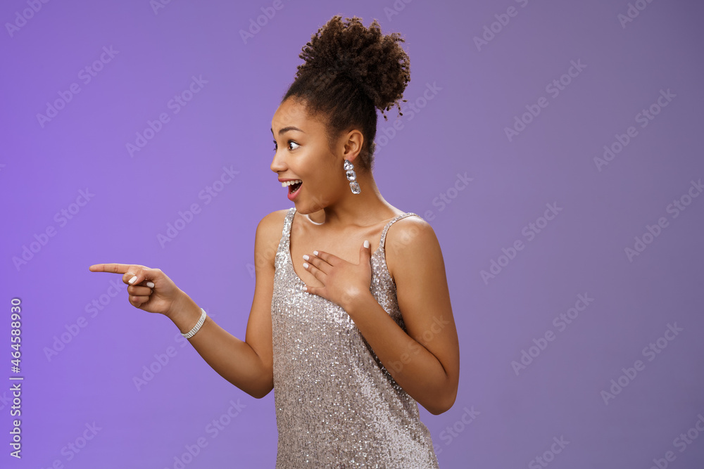 Impressed speechless thrilled elegant young african-american woman see ...