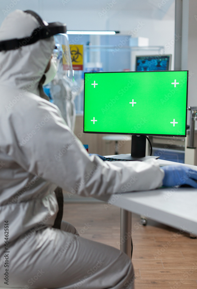 Microbiologist researcher with covid19 protective medical equipment ...