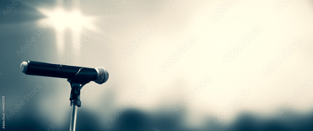 Microphone Public speaking background, Hand is holding microphone on ...