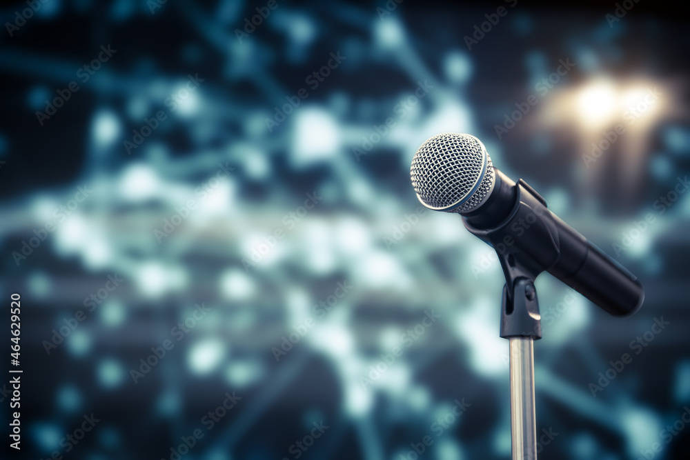 Microphone Public speaking background, Hand is holding microphone on ...