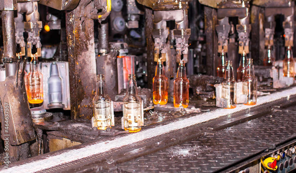 Glass factory, industrial production of glass containers. Modern ...