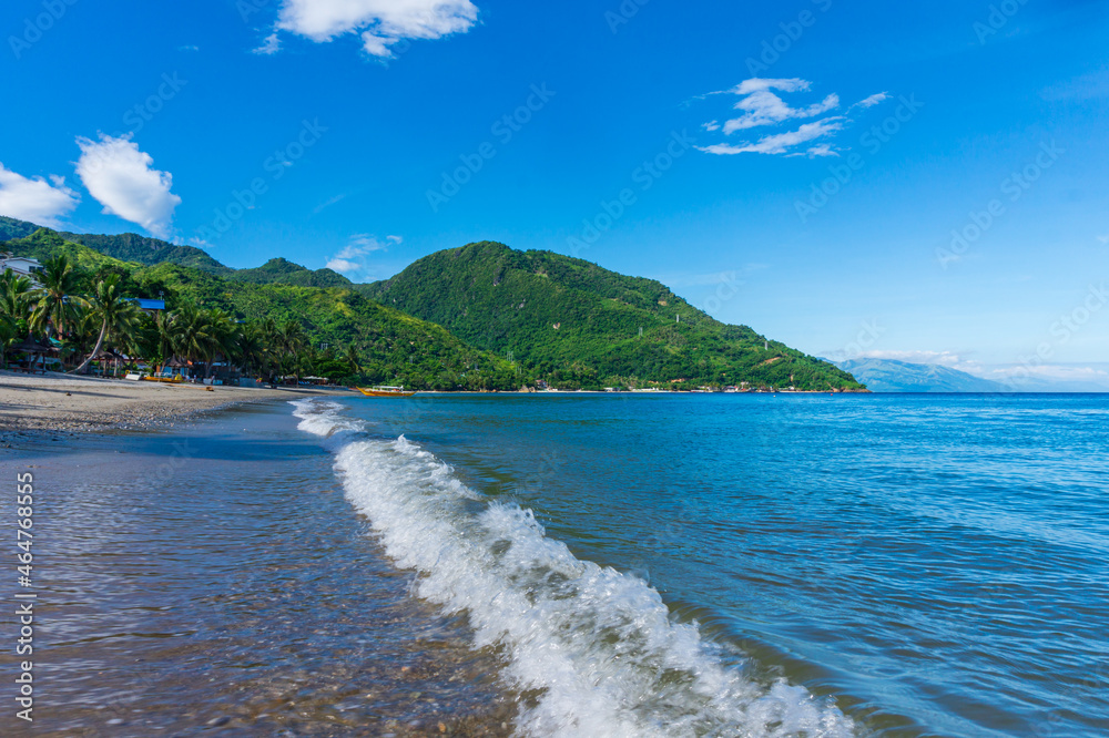 Tropical Aninuan beach view in Puerto Galera, Mindoro Island ...