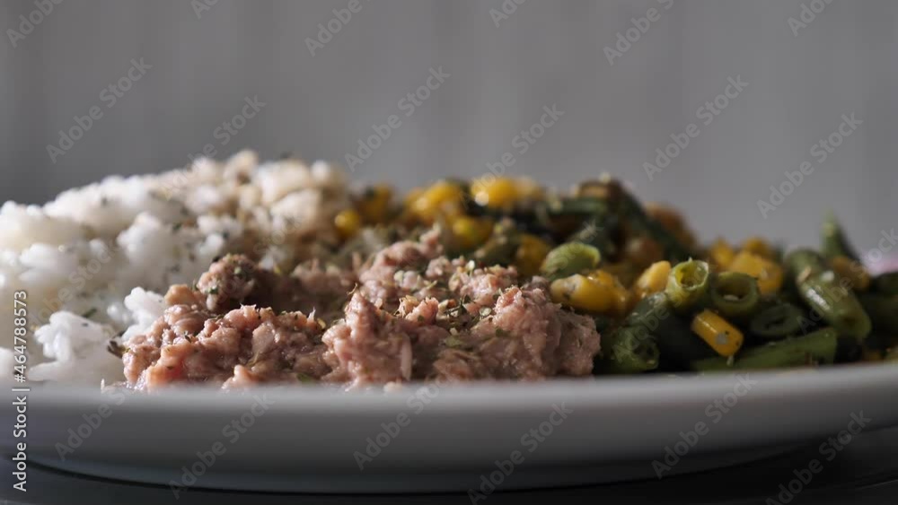 Hawaiian rice dish with vegetables and tuna. Asian popular white rice ...