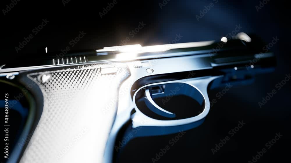 Elegant shiny pistol on dark background. Gun in harsh light. Stock ...