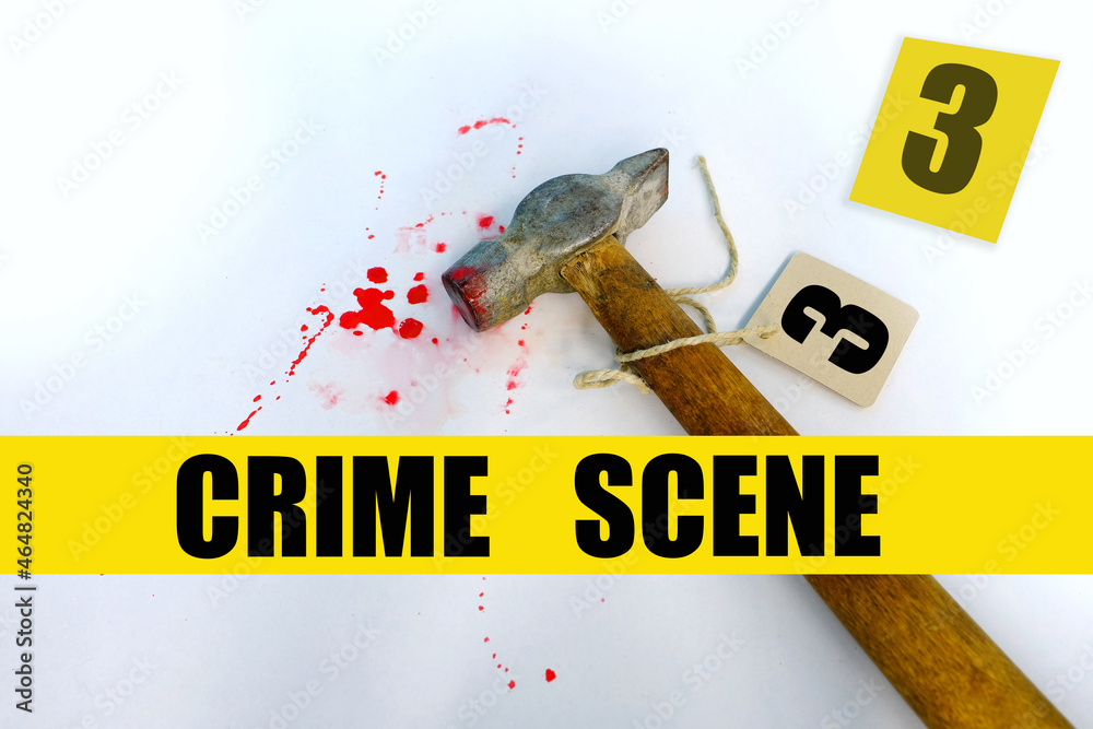 fresh splatter of red blood on white table, hammer at crime scene ...