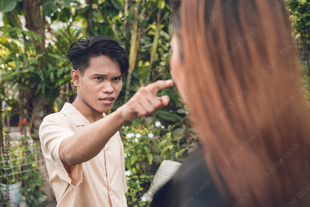 An irate Filipino man accuses his girlfriend of infidelity. Scolding ...