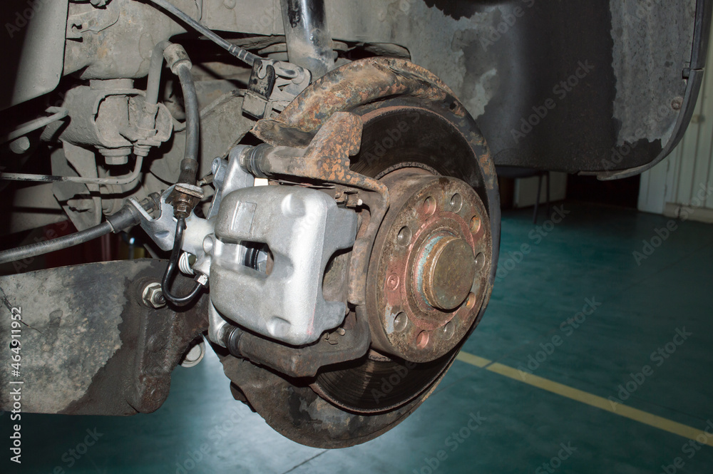 Front view of the brake system of the rear left wheel of the car after ...