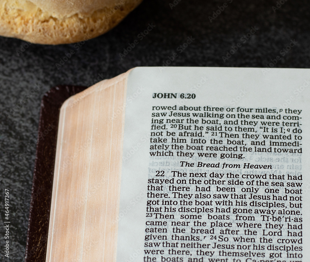Open Holy Bible Book with bread. Christian biblical concept of God ...