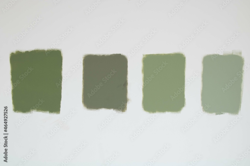Testing green color tones on a wall. Interior design with differents ...
