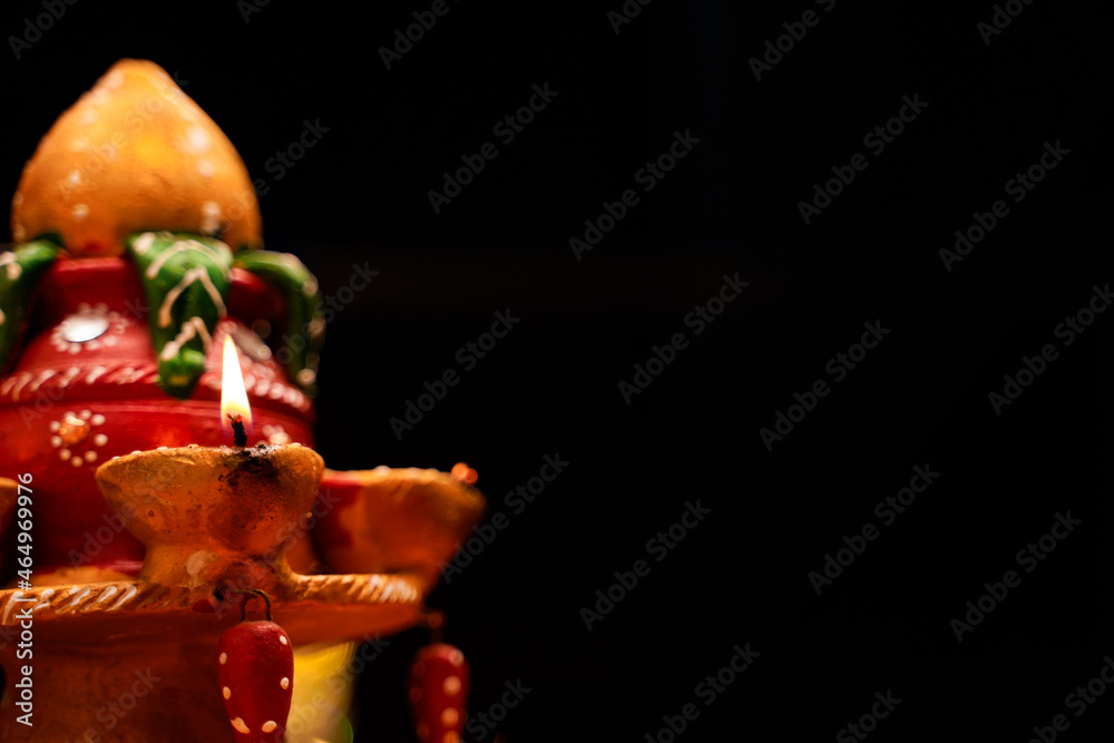 Traditional oil lamps with flower decoration for indian festival diwali ...