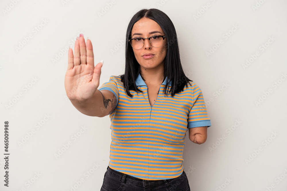 Young caucasian woman with one arm isolated on white background ...