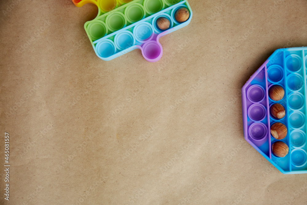 Pop it toy with hazel nuts. Invented games for motor skills development ...