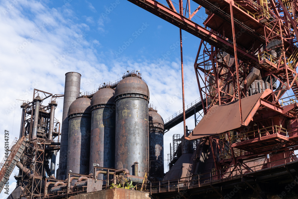 Abandoned steel mill, large blast furnaces and industrial structures ...